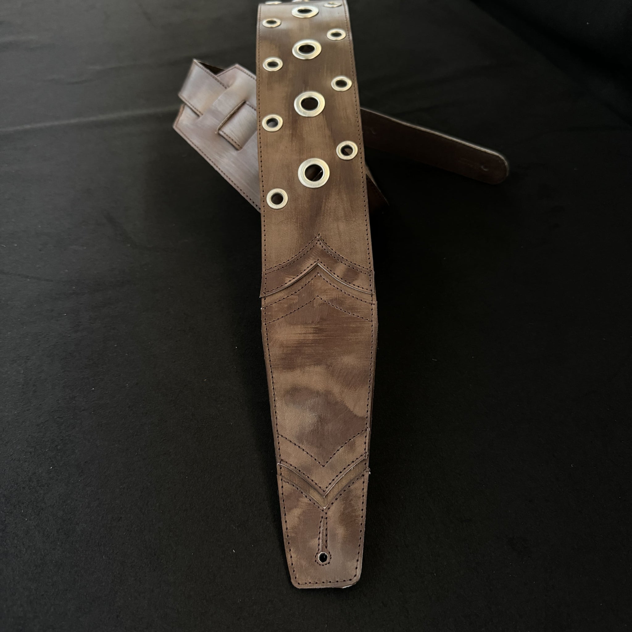 Aged strap metal eyelets – GBS